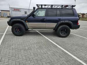 Blue Nissan Patrol 2003 in Taurage, with an engine capacity of 3.00 L and mileage of 223 thousand km for 25000 €, photo 5 on AUTOMOTO.COM.LV