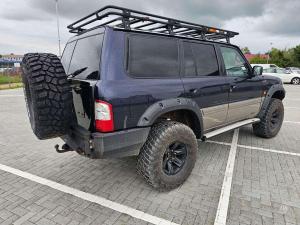 Blue Nissan Patrol 2003 in Taurage, with an engine capacity of 3.00 L and mileage of 223 thousand km for 25000 €, photo 7 on AUTOMOTO.COM.LV