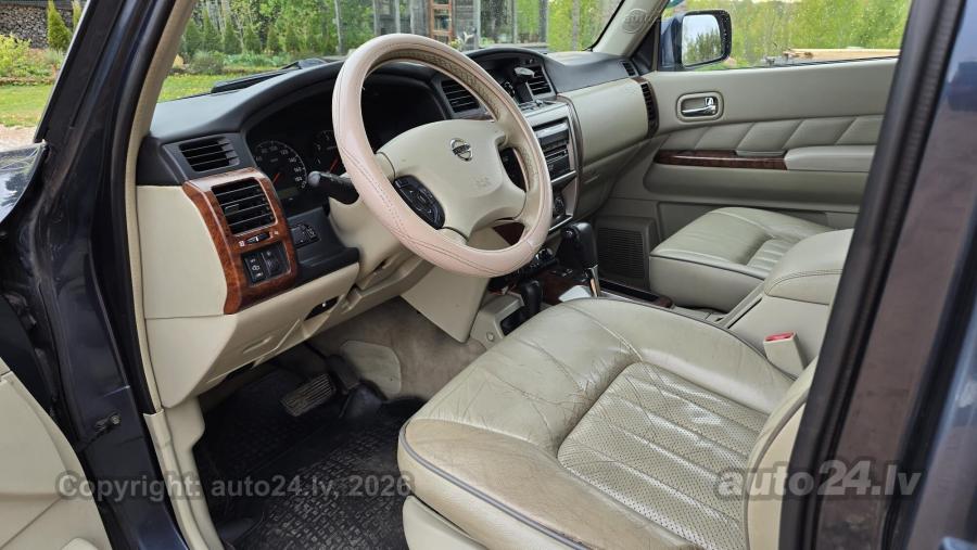 Blue Nissan Patrol 2004 in Tartu, with an engine capacity of 3.00 L and mileage of 398 thousand km for 15000 €, photo 9 on AUTOMOTO.COM.LV