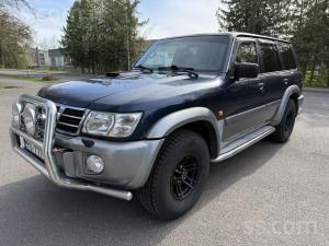 Zils Nissan Patrol 2004 Ogre, ar dzinēja tilpumu 3.00 L un nobraukumu 370 tūkst. km par 10200 €, foto  vietnē AUTOMOTO.COM.LV