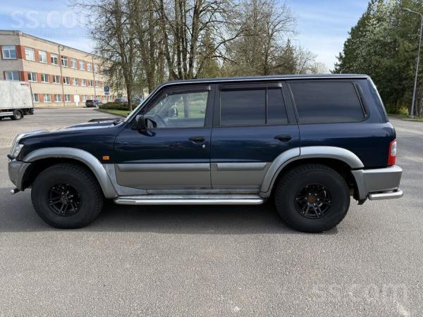 Blue Nissan Patrol 2004 in Ogre, with an engine capacity of 3.00 L and mileage of 370 thousand km for 10200 €, photo 2 on AUTOMOTO.COM.LV