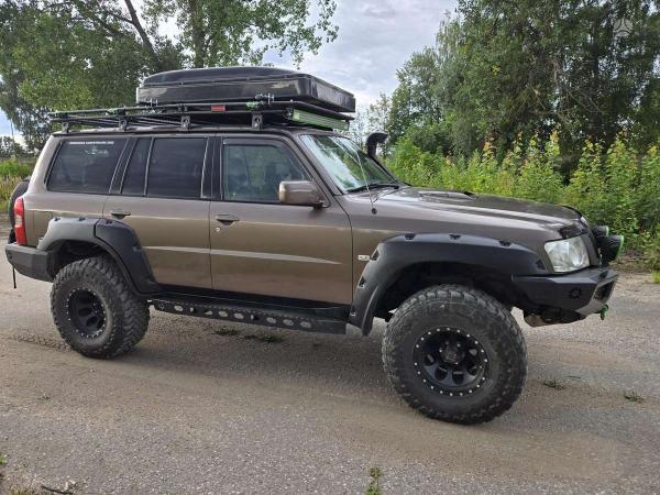 Brūns Nissan Patrol 2006 Jelgava, ar dzinēja tilpumu 2.95 L un nobraukumu 248 tūkst. km par 24900 €, foto 11 vietnē AUTOMOTO.COM.LV