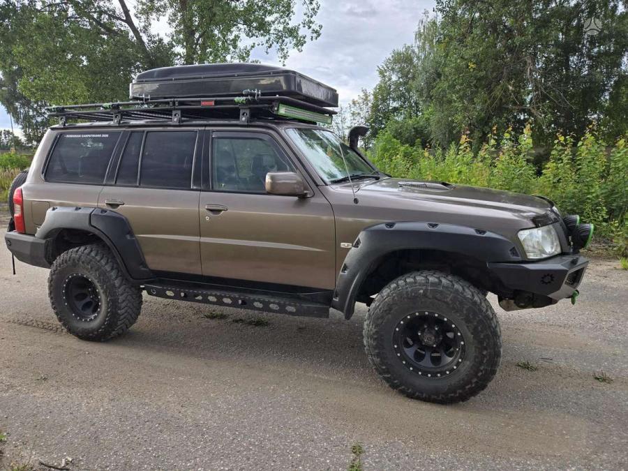 Brūns Nissan Patrol 2006 Jelgava, ar dzinēja tilpumu 2.95 L un nobraukumu 248 tūkst. km par 24900 €, foto 11 vietnē AUTOMOTO.COM.LV