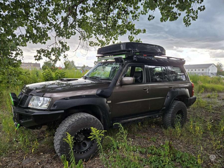 Brūns Nissan Patrol 2006 Jelgava, ar dzinēja tilpumu 2.95 L un nobraukumu 248 tūkst. km par 24900 €, foto 13 vietnē AUTOMOTO.COM.LV