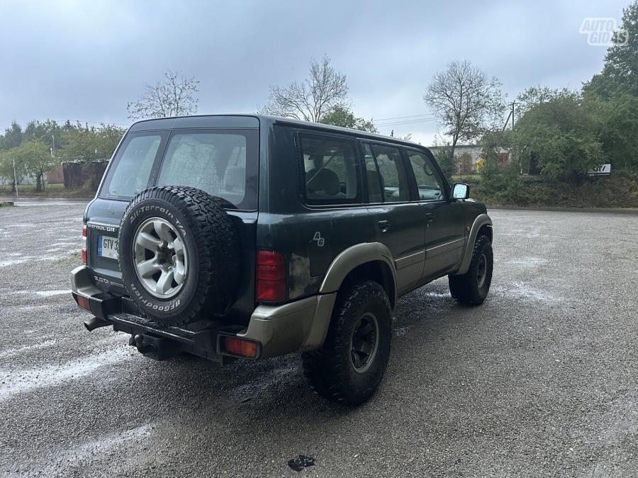 Green Nissan Patrol 2002 in Kaunas, with an engine capacity of 3.00 L and mileage of 197 thousand km for 8400 €, photo 4 on AUTOMOTO.COM.LV