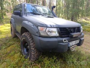 Grey Nissan Patrol 1999 in Riga, with an engine capacity of 3.00 L and mileage of 233 thousand km for 13900 €, photo 4 on AUTOMOTO.COM.LV