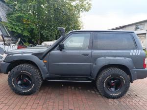 Grey Nissan Patrol 1999 in Riga, with an engine capacity of 3.00 L and mileage of 233 thousand km for 13900 €, photo 7 on AUTOMOTO.COM.LV