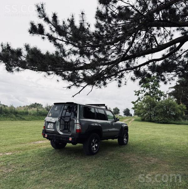 Pelēks Nissan Patrol 2003 Bauska, ar dzinēja tilpumu 3.00 L un nobraukumu 284 tūkst. km par 8500 €, foto 3 vietnē AUTOMOTO.COM.LV