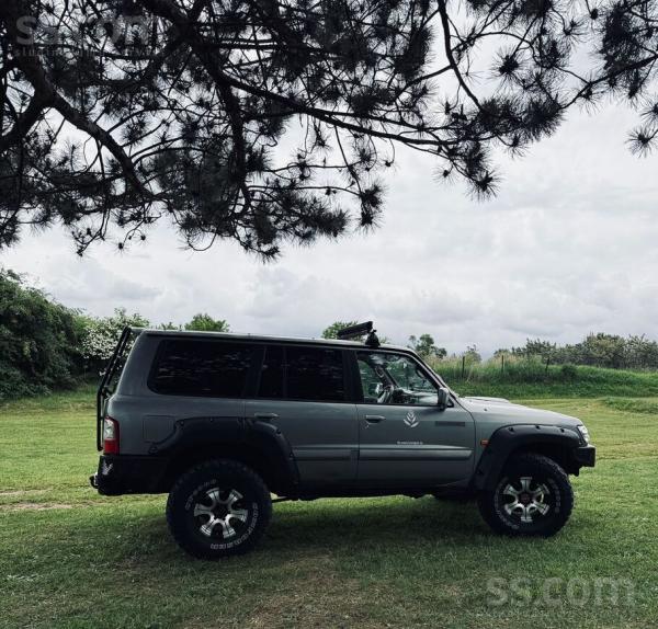 Pelēks Nissan Patrol 2003 Bauska, ar dzinēja tilpumu 3.00 L un nobraukumu 284 tūkst. km par 8500 €, foto 4 vietnē AUTOMOTO.COM.LV