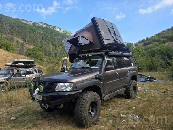 Violet Nissan Patrol 2006 in Jelgava, with an engine capacity of 3.00 L and mileage of 248 thousand km for 24900 €, photo 1 on AUTOMOTO.COM.LV