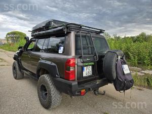 Violets Nissan Patrol 2006 Jelgava, ar dzinēja tilpumu 3.00 L un nobraukumu 248 tūkst. km par 24900 €, foto 5 vietnē AUTOMOTO.COM.LV