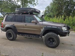 Violets Nissan Patrol 2006 Jelgava, ar dzinēja tilpumu 3.00 L un nobraukumu 248 tūkst. km par 24900 €, foto 6 vietnē AUTOMOTO.COM.LV