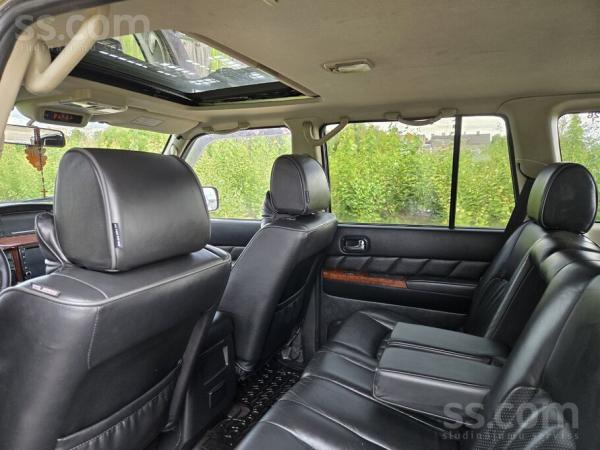 Violet Nissan Patrol 2006 in Jelgava, with an engine capacity of 3.00 L and mileage of 248 thousand km for 24900 €, photo 7 on AUTOMOTO.COM.LV