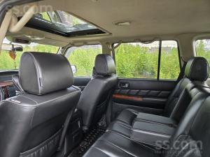 Violets Nissan Patrol 2006 Jelgava, ar dzinēja tilpumu 3.00 L un nobraukumu 248 tūkst. km par 24900 €, foto 8 vietnē AUTOMOTO.COM.LV