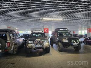 Violets Nissan Patrol 2006 Jelgava, ar dzinēja tilpumu 3.00 L un nobraukumu 248 tūkst. km par 24900 €, foto 13 vietnē AUTOMOTO.COM.LV