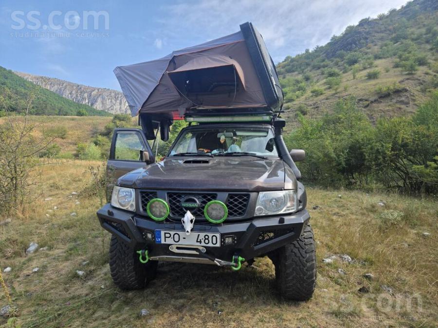 Violets Nissan Patrol 2006 Jelgava, ar dzinēja tilpumu 3.00 L un nobraukumu 248 tūkst. km par 24900 €, foto 14 vietnē AUTOMOTO.COM.LV