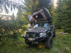 Violets Nissan Patrol 2006 Jelgava, ar dzinēja tilpumu 3.00 L un nobraukumu 248 tūkst. km par 24900 €, foto 16 vietnē AUTOMOTO.COM.LV