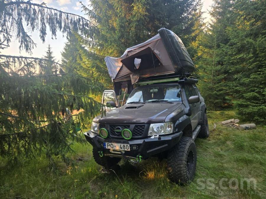 Violets Nissan Patrol 2006 Jelgava, ar dzinēja tilpumu 3.00 L un nobraukumu 248 tūkst. km par 24900 €, foto 16 vietnē AUTOMOTO.COM.LV