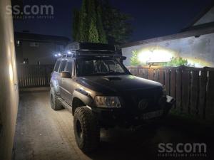 Violets Nissan Patrol 2006 Jelgava, ar dzinēja tilpumu 3.00 L un nobraukumu 248 tūkst. km par 24900 €, foto 22 vietnē AUTOMOTO.COM.LV
