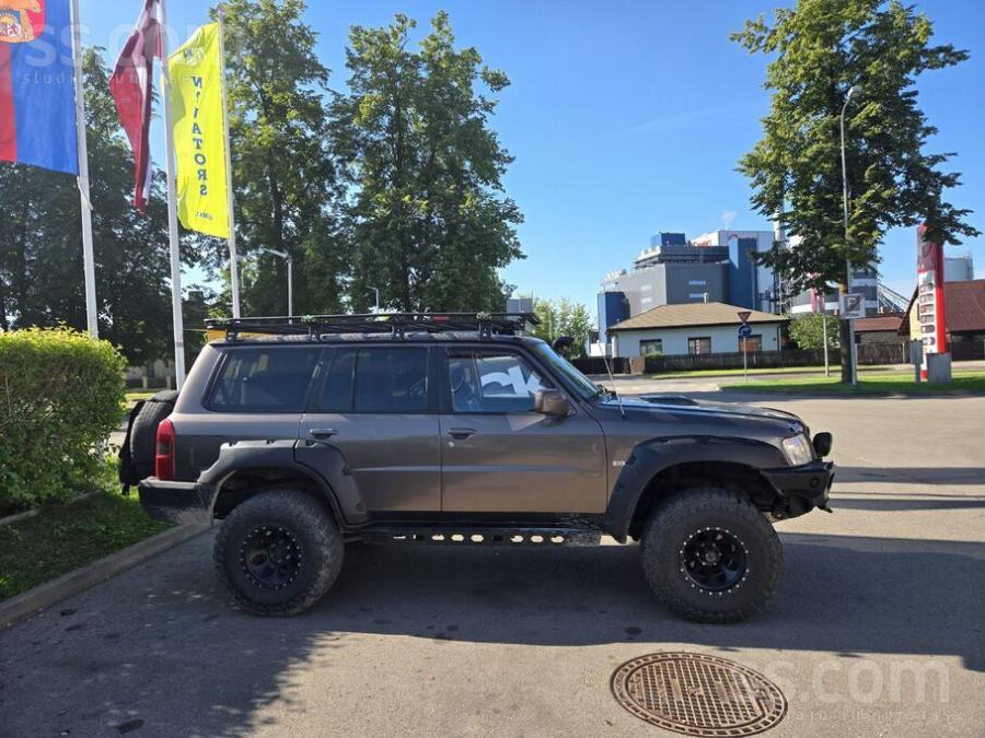 Violets Nissan Patrol 2006 Jelgava, ar dzinēja tilpumu 3.00 L un nobraukumu 248 tūkst. km par 24900 €, foto 23 vietnē AUTOMOTO.COM.LV
