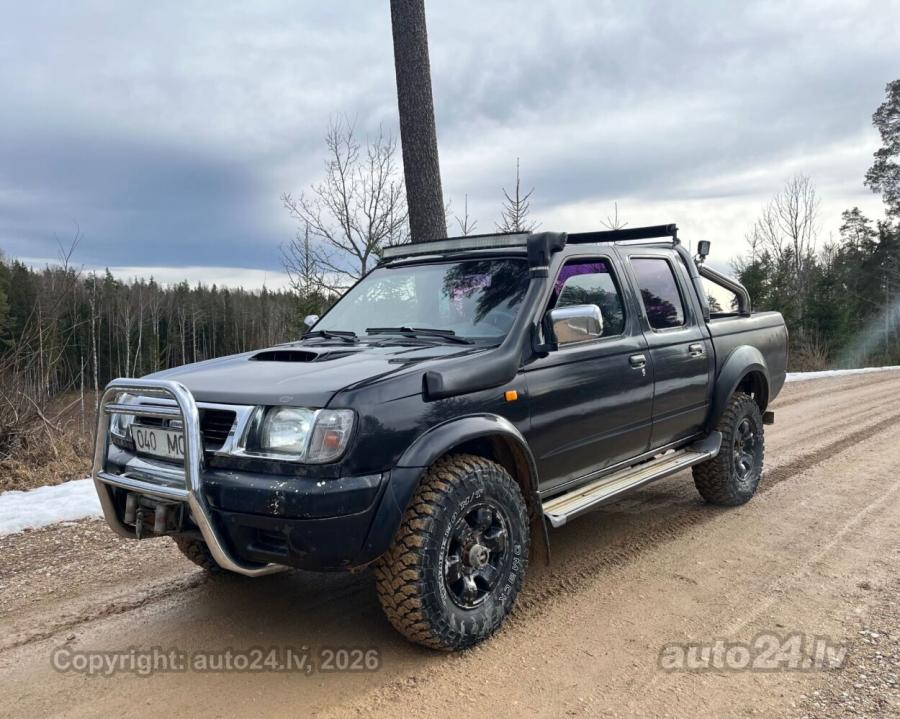 Black Nissan Pickup 2001 in Tartu, with an engine capacity of 2.50 L and mileage of 444 thousand km for 4499 €, photo 1 on AUTOMOTO.COM.LV