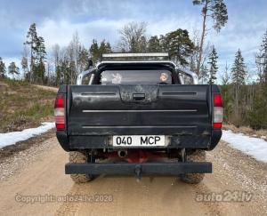 Black Nissan Pickup 2001 in Tartu, with an engine capacity of 2.50 L and mileage of 444 thousand km for 4499 €, photo 7 on AUTOMOTO.COM.LV