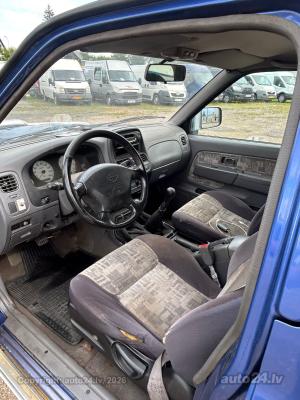 Zils Nissan Pickup 2002 Valga, ar dzinēja tilpumu 2.50 L un nobraukumu 197 tūkst. km par 2400 €, foto 11 vietnē AUTOMOTO.COM.LV