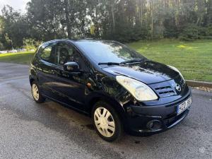 Black Nissan Pixo 2011 in Vilnius, with an engine capacity of 1.00 L and mileage of 118 thousand km for 980 €, photo  on AUTOMOTO.COM.LV