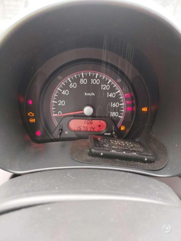 Red Nissan Pixo 2010 in Jurbarkas, with an engine capacity of 1.00 L and mileage of 158 thousand km for 500 €, photo 8 on AUTOMOTO.COM.LV