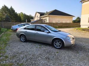 Grey Nissan Primera 2003 in Vilnius, with an engine capacity of 2.20 L and mileage of 255 thousand km for 950 €, photo 3 on AUTOMOTO.COM.LV