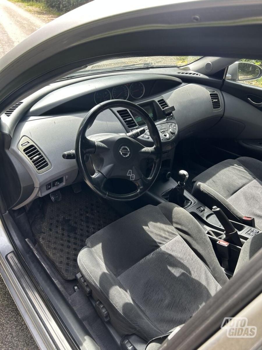 Grey Nissan Primera 2003 in Alytus, with an engine capacity of 2.20 L and mileage of 201 thousand km for 699 €, photo 8 on AUTOMOTO.COM.LV