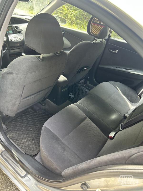 Grey Nissan Primera 2003 in Alytus, with an engine capacity of 2.20 L and mileage of 201 thousand km for 699 €, photo 9 on AUTOMOTO.COM.LV