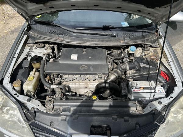 Grey Nissan Primera 2003 in Alytus, with an engine capacity of 2.20 L and mileage of 201 thousand km for 699 €, photo 10 on AUTOMOTO.COM.LV
