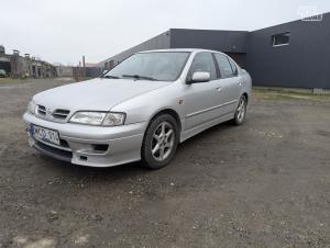 Grey Nissan Primera 1997 in Marijampole, with an engine capacity of 2.00 L and mileage of 227 thousand km for 1450 €, photo  on AUTOMOTO.COM.LV