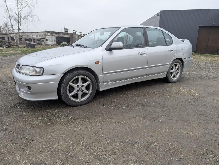 Grey Nissan Primera 1997 in Marijampole, with an engine capacity of 2.00 L and mileage of 227 thousand km for 1450 €, photo 2 on AUTOMOTO.COM.LV