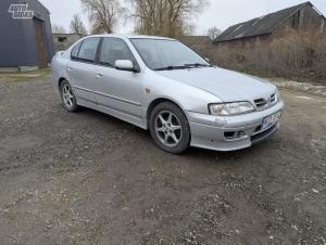 Grey Nissan Primera 1997 in Marijampole, with an engine capacity of 2.00 L and mileage of 227 thousand km for 1450 €, photo 5 on AUTOMOTO.COM.LV