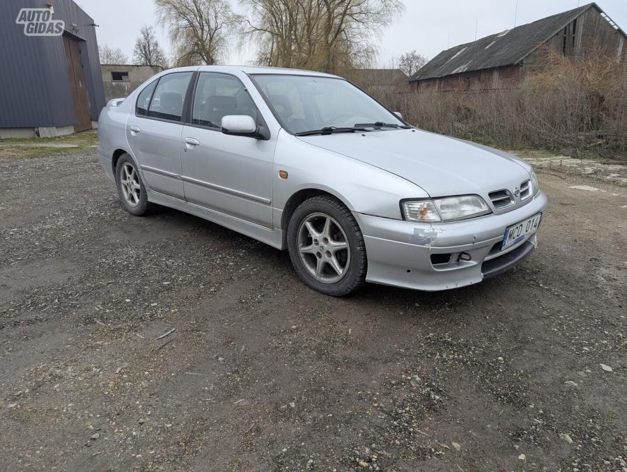 Grey Nissan Primera 1997 in Marijampole, with an engine capacity of 2.00 L and mileage of 227 thousand km for 1450 €, photo 5 on AUTOMOTO.COM.LV