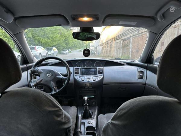 Grey Nissan Primera 2003 in Vilnius, with an engine capacity of 2.18 L and mileage of 316 thousand km for 900 €, photo 5 on AUTOMOTO.COM.LV