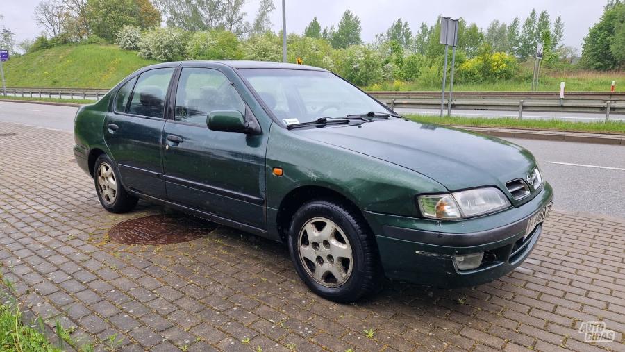 Nissan Primera 1997 in Marijampole, with an engine capacity of 2.00 L and mileage of 235 thousand km for 750 €, photo 13 on AUTOMOTO.COM.LV