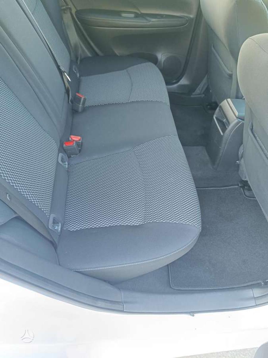 White Nissan Pulsar 2016 in Siauliai, with an engine capacity of 1.20 L and mileage of 97 thousand km for 5100 €, photo 14 on AUTOMOTO.COM.LV