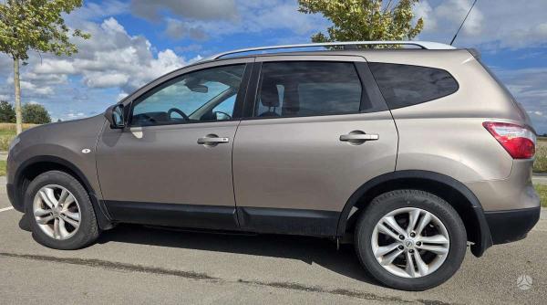 Brown Nissan qashqai+2 2011 in Marijampole, with an engine capacity of 1.46 L and mileage of 360 thousand km for 4750 €, photo 3 on AUTOMOTO.COM.LV