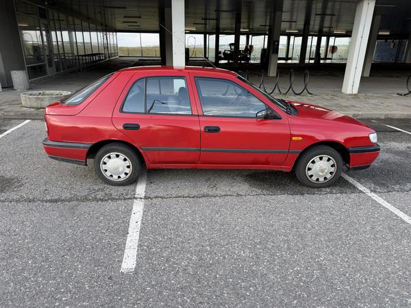 Red Nissan Sunny 1992 in Tallinn, with an engine capacity of 0.00 L and mileage of 169 thousand km for 1000 €, photo 6 on AUTOMOTO.COM.LV