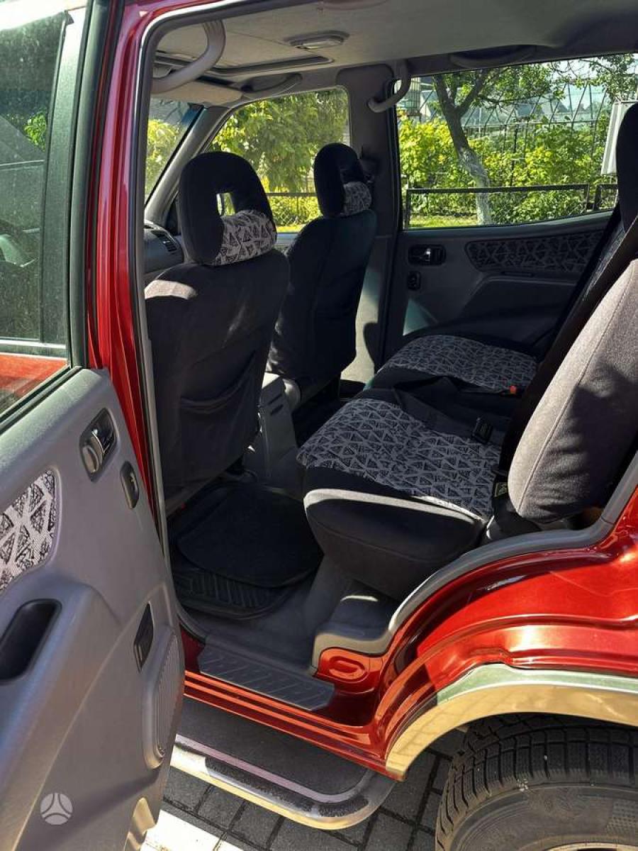 Sarkans Nissan Terrano 1999 Panevēža, ar dzinēja tilpumu 2.66 L un nobraukumu 182 tūkst. km par 4200 €, foto 8 vietnē AUTOMOTO.COM.LV