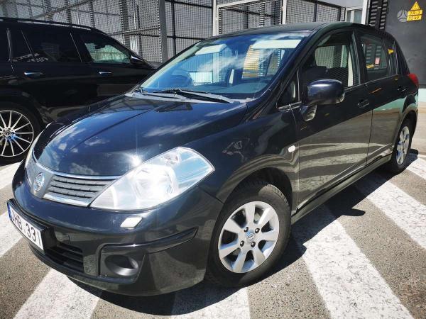 Black Nissan TIIDA 2008 in Vilnius, with an engine capacity of 1.50 L and mileage of 235 thousand km for 2450 €, photo 1 on AUTOMOTO.COM.LV