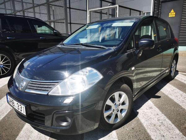 Black Nissan TIIDA 2008 in Vilnius, with an engine capacity of 1.46 L and mileage of 223 thousand km for 2550 €, photo 2 on AUTOMOTO.COM.LV
