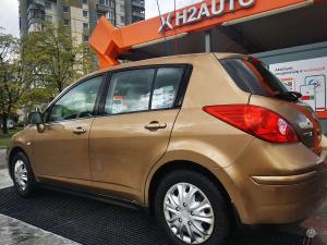Brūns Nissan TIIDA 2008 Viļņa, ar dzinēja tilpumu 1.60 L un nobraukumu 144 tūkst. km par 2950 €, foto  vietnē AUTOMOTO.COM.LV