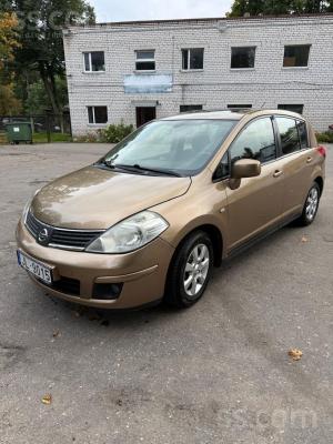Brūns Nissan TIIDA 2008 Rīga, ar dzinēja tilpumu 1.60 L un nobraukumu 145 tūkst. km par 2600 €, foto  vietnē AUTOMOTO.COM.LV