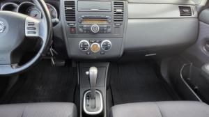 Brown Nissan TIIDA 2008 in Riga, with an engine capacity of 1.60 L and mileage of 156 thousand km for 2750 €, photo 5 on AUTOMOTO.COM.LV