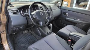 Brown Nissan TIIDA 2008 in Riga, with an engine capacity of 1.60 L and mileage of 156 thousand km for 2750 €, photo 14 on AUTOMOTO.COM.LV