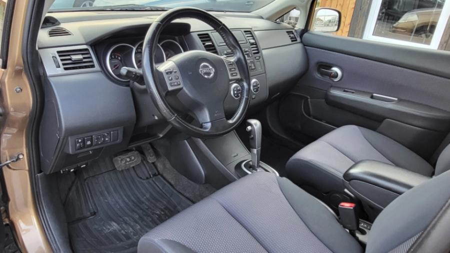 Brown Nissan TIIDA 2008 in Riga, with an engine capacity of 1.60 L and mileage of 156 thousand km for 2750 €, photo 14 on AUTOMOTO.COM.LV